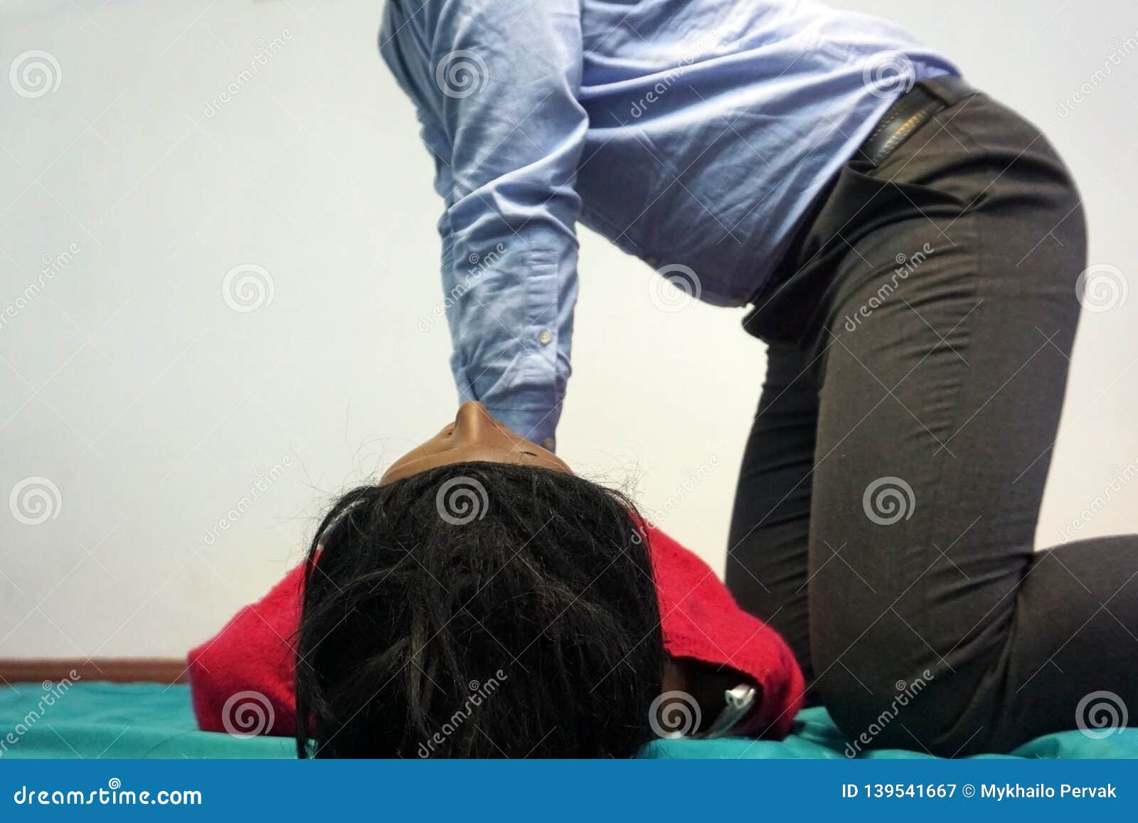 Performing Cpr on a Simulation Mannequin Dummy during Medical Training ...