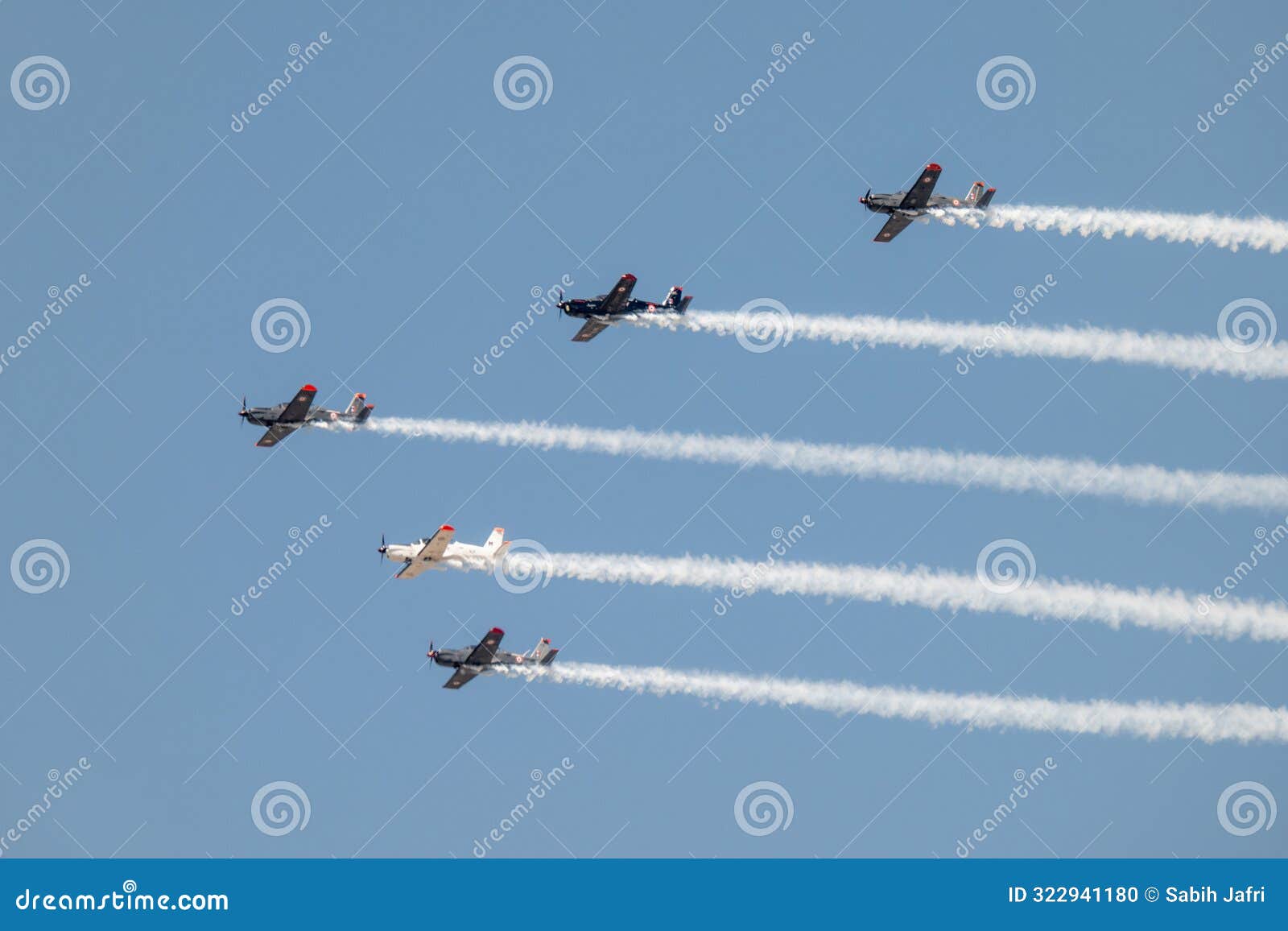 Performing Fighter Planes Flying in Formation Stock Photo - Image of ...