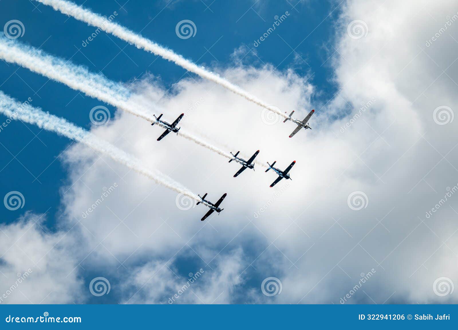 Performing Fighter Planes Flying in Formation Stock Photo - Image of ...