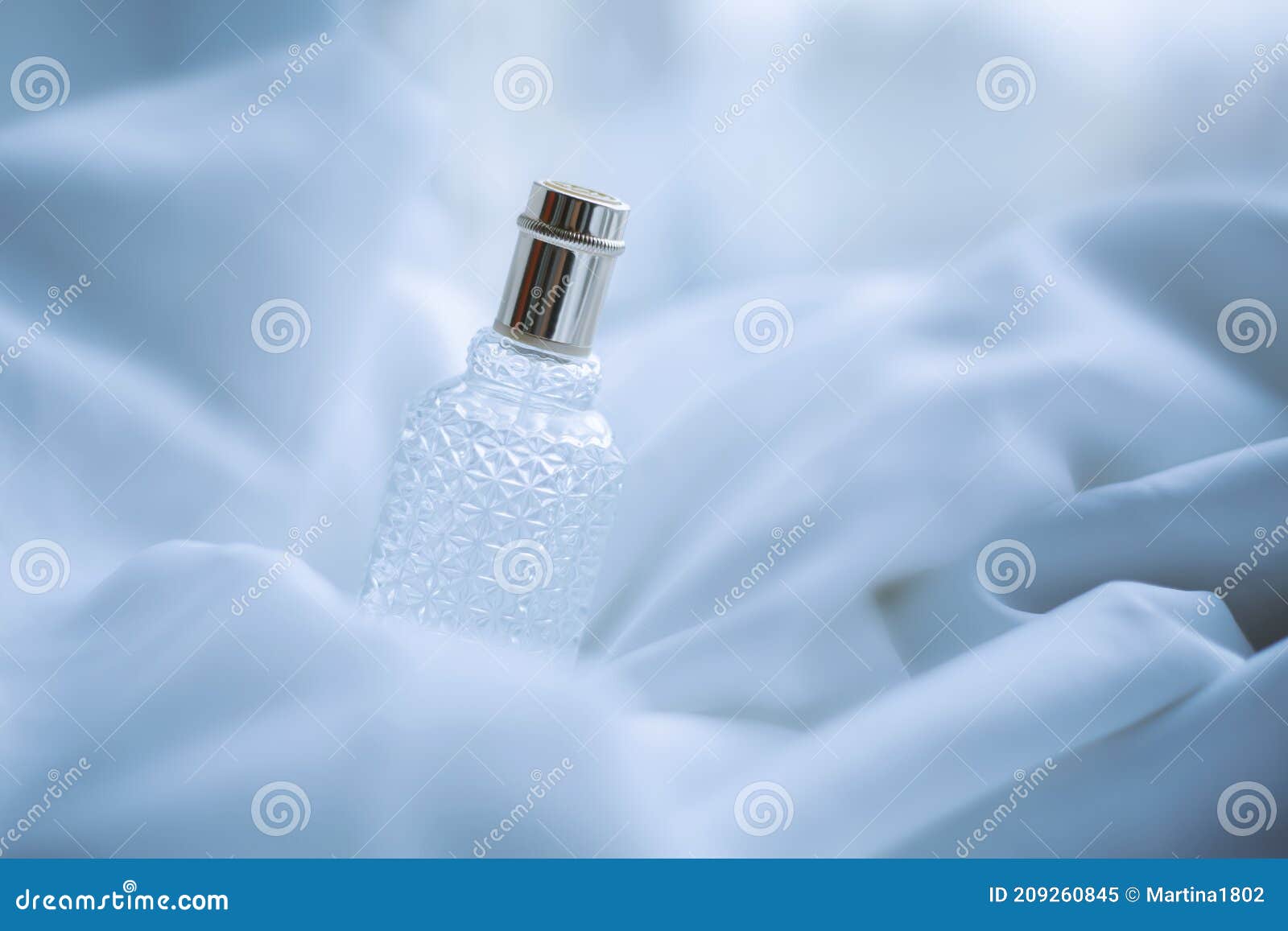 Perfume Bottle on White Cloth Stock Image - Image of perfume, beautiful ...
