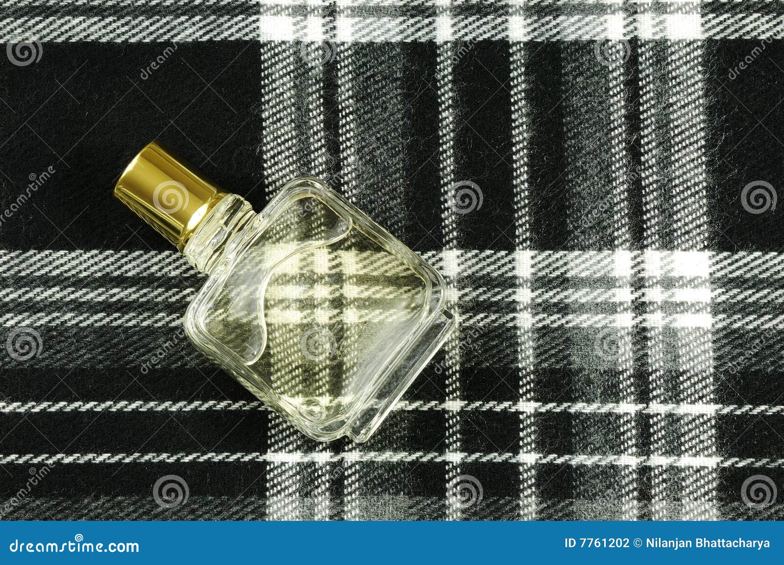 Perfume Bottle on Check Pattern Stock Photo - Image of smell, deodorant ...