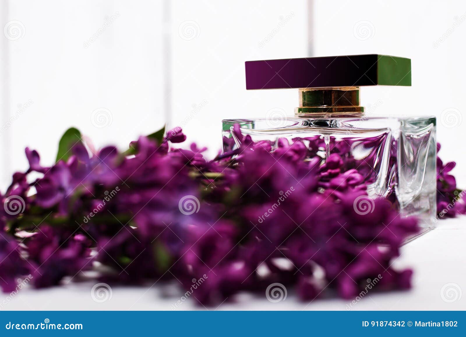 Perfume bottle with flower stock photo. Image of crystal - 91874342
