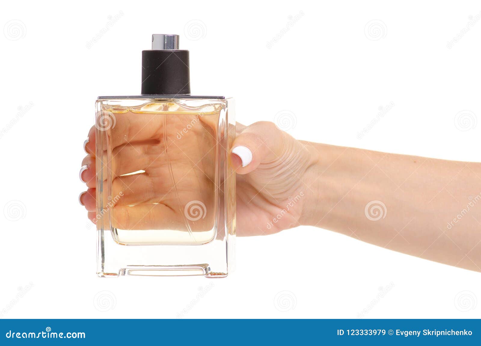 Perfume bottle in hand stock image. Image of glass, elegant - 123333979