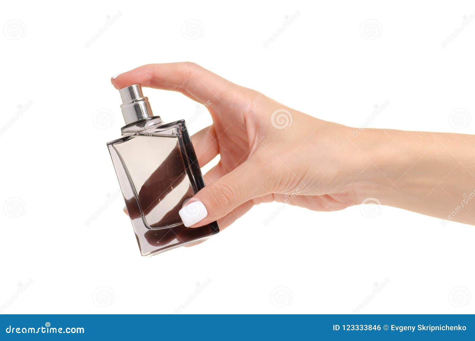 Perfume bottle in hand stock photo. Image of femininity - 123333846