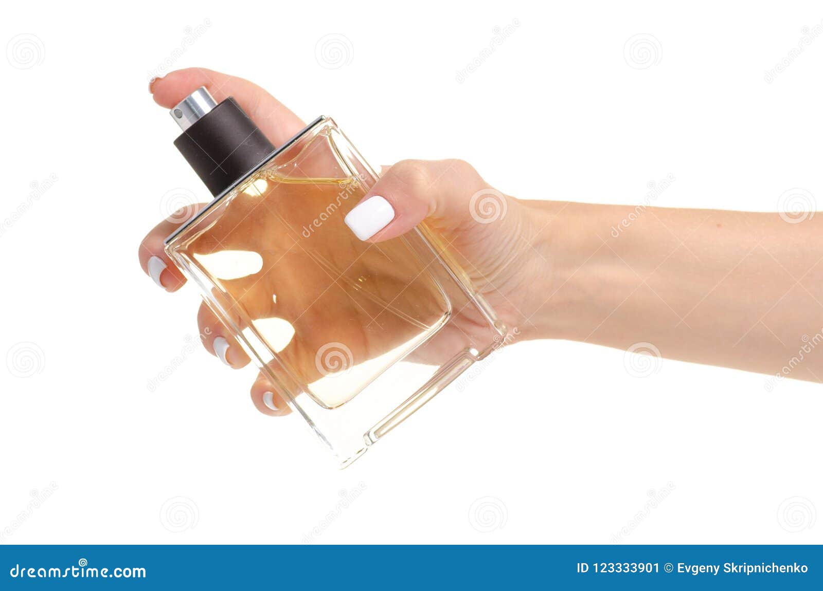 Perfume bottle in hand stock image. Image of fragrance - 123333901