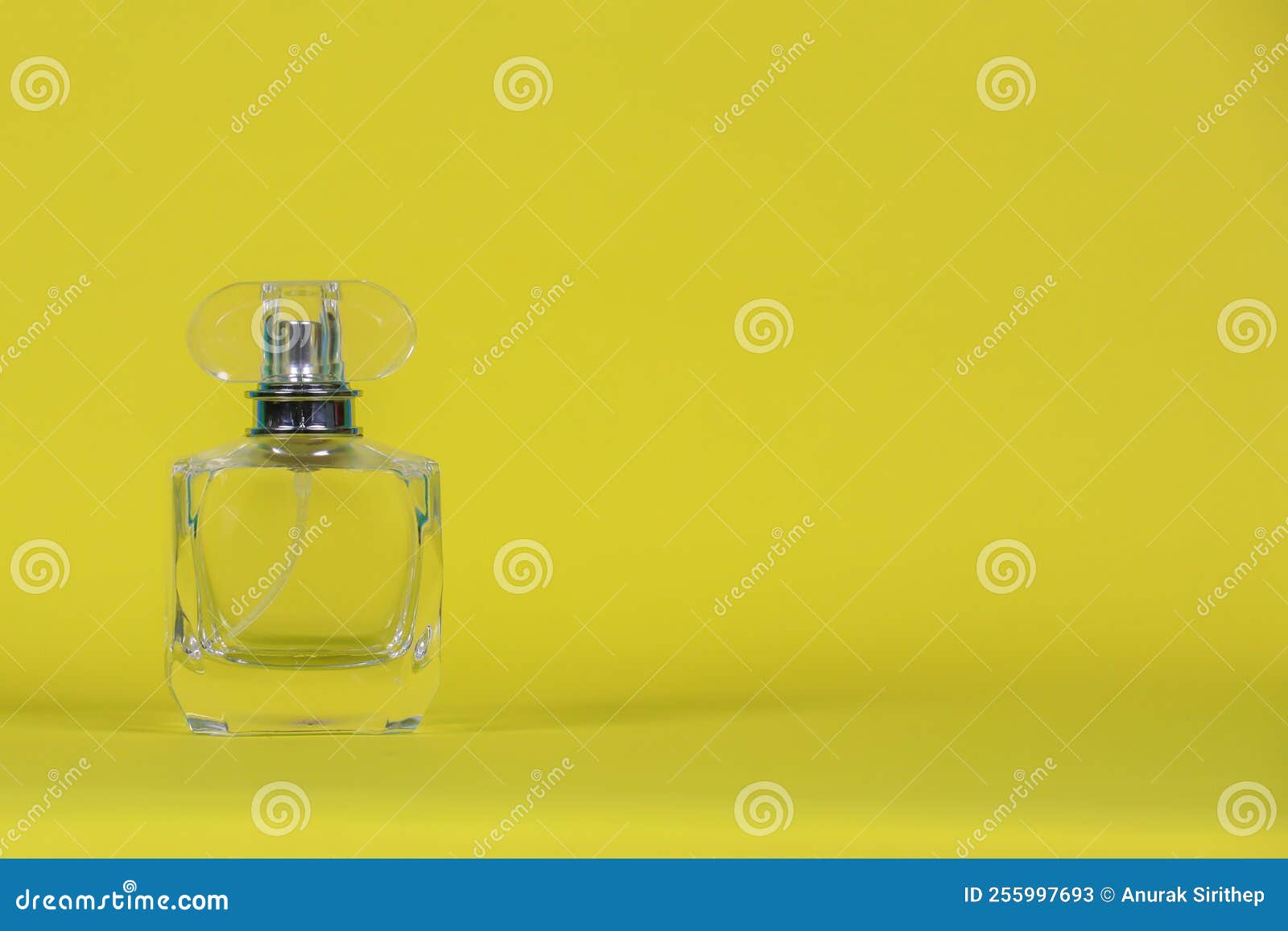 Perfume Bottle.laid on a Yellow Background with Copy Space for Design ...