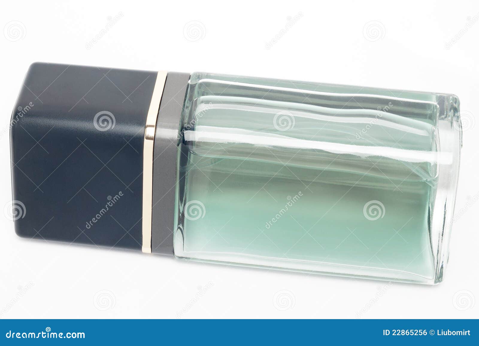 Perfume Bottle Lying on Side Stock Photo - Image of golden, cosmetic ...