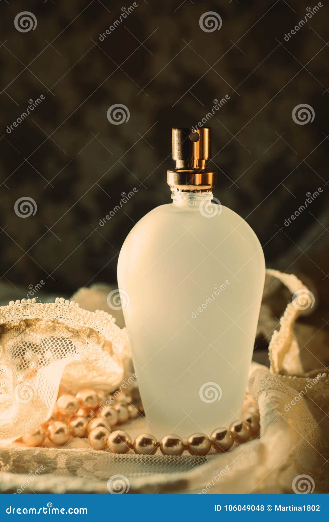 Perfume bottle with pearls stock photo. Image of dulcet - 106049048