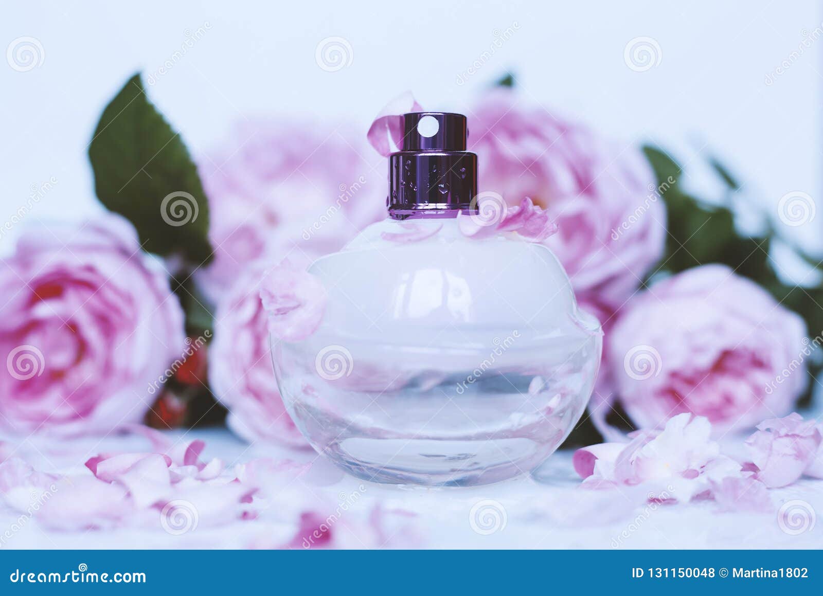 Perfume with roses stock photo. Image of essence, flower - 131150048