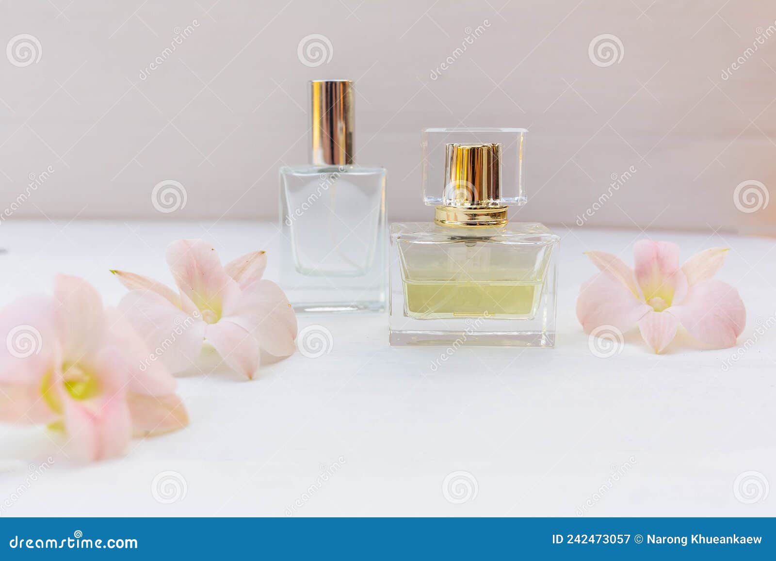 Perfume and Perfume Bottle with Pink Flowers Stock Image - Image of ...