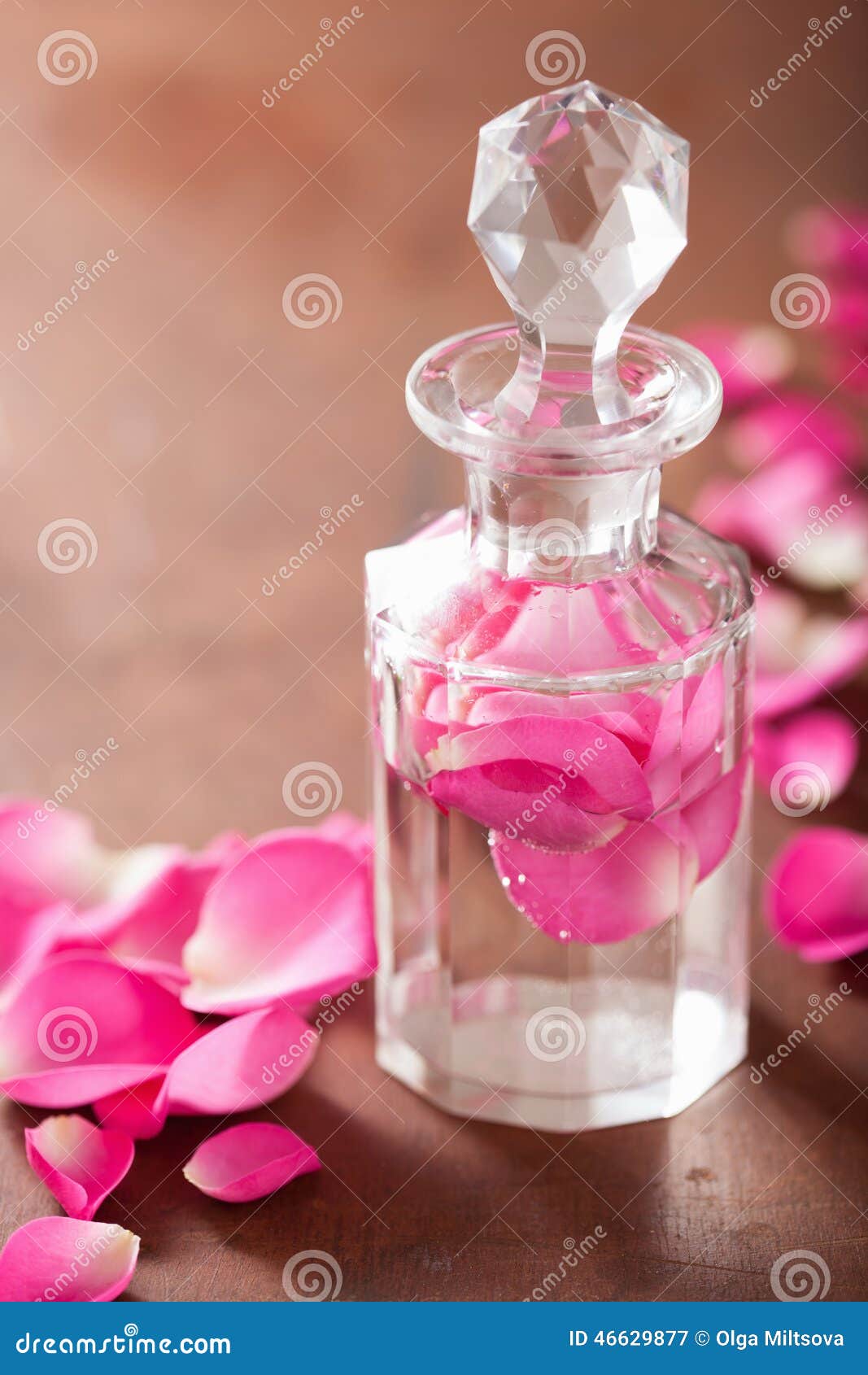 Perfume Bottle and Pink Rose Flowers. Spa Aromatherapy Stock Image ...