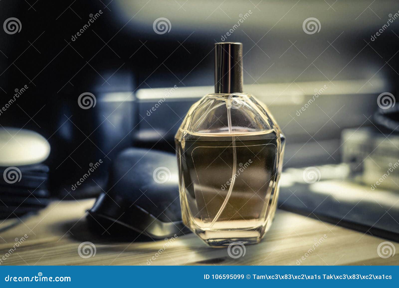 Perfume Bottle Placed on Desk, Background in Office Supplies Stock ...