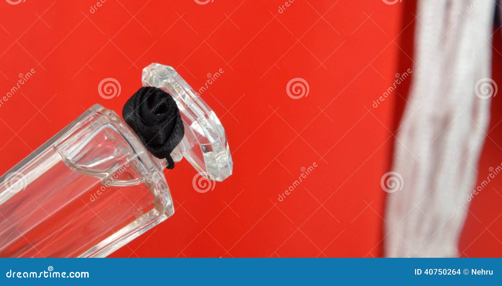 Perfume bottle on red back stock photo. Image of male - 40750264