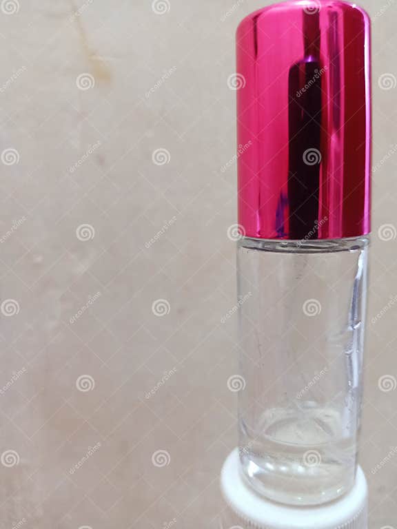 Perfume Bottle with Red Cap, Space Area Stock Photo - Image of space ...
