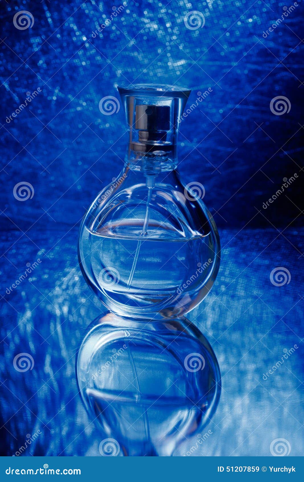 Perfume Bottle with Reflection on Blue Stock Image - Image of retail ...