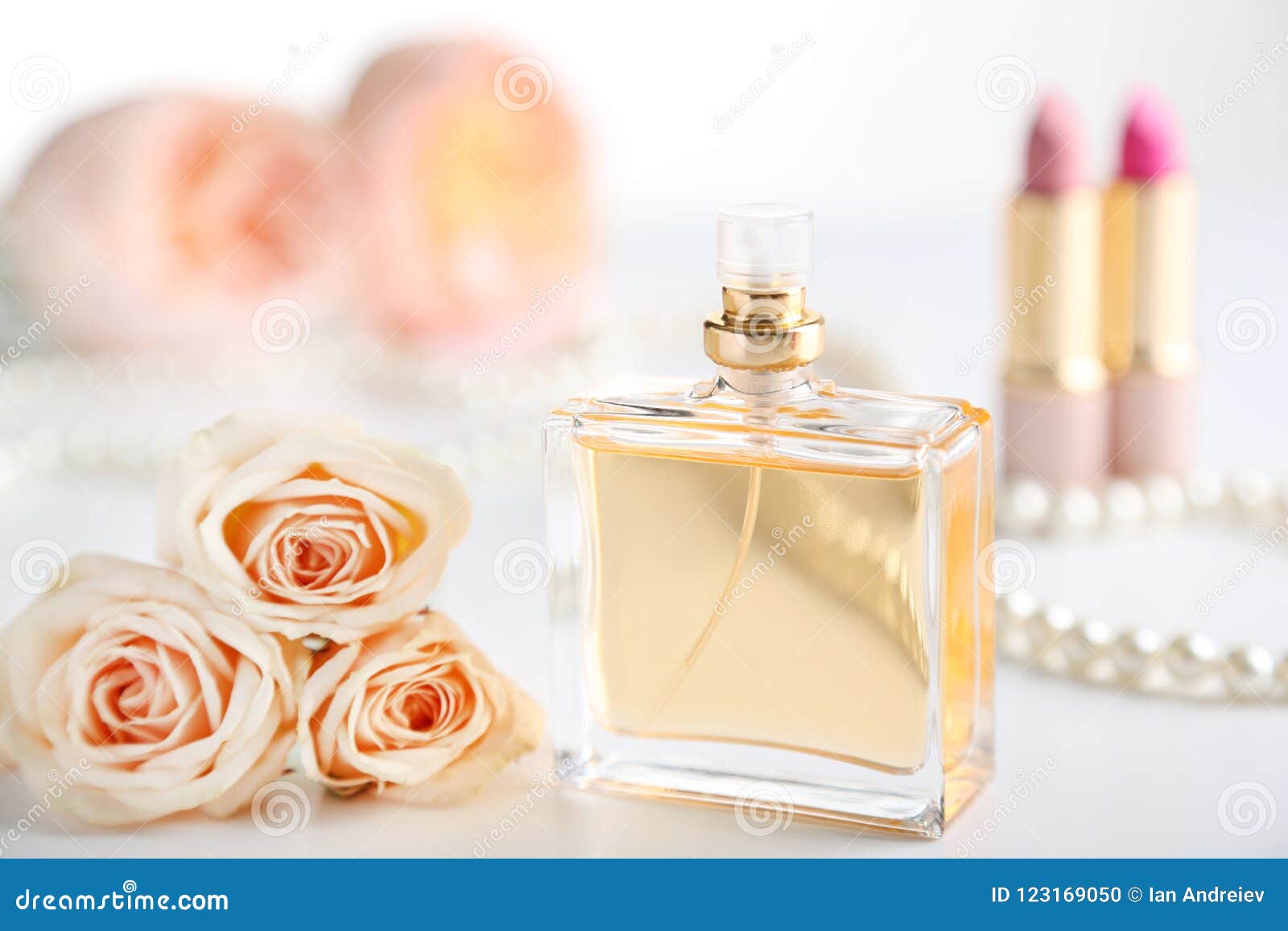 Perfume bottle with roses stock photo. Image of glass - 123169050