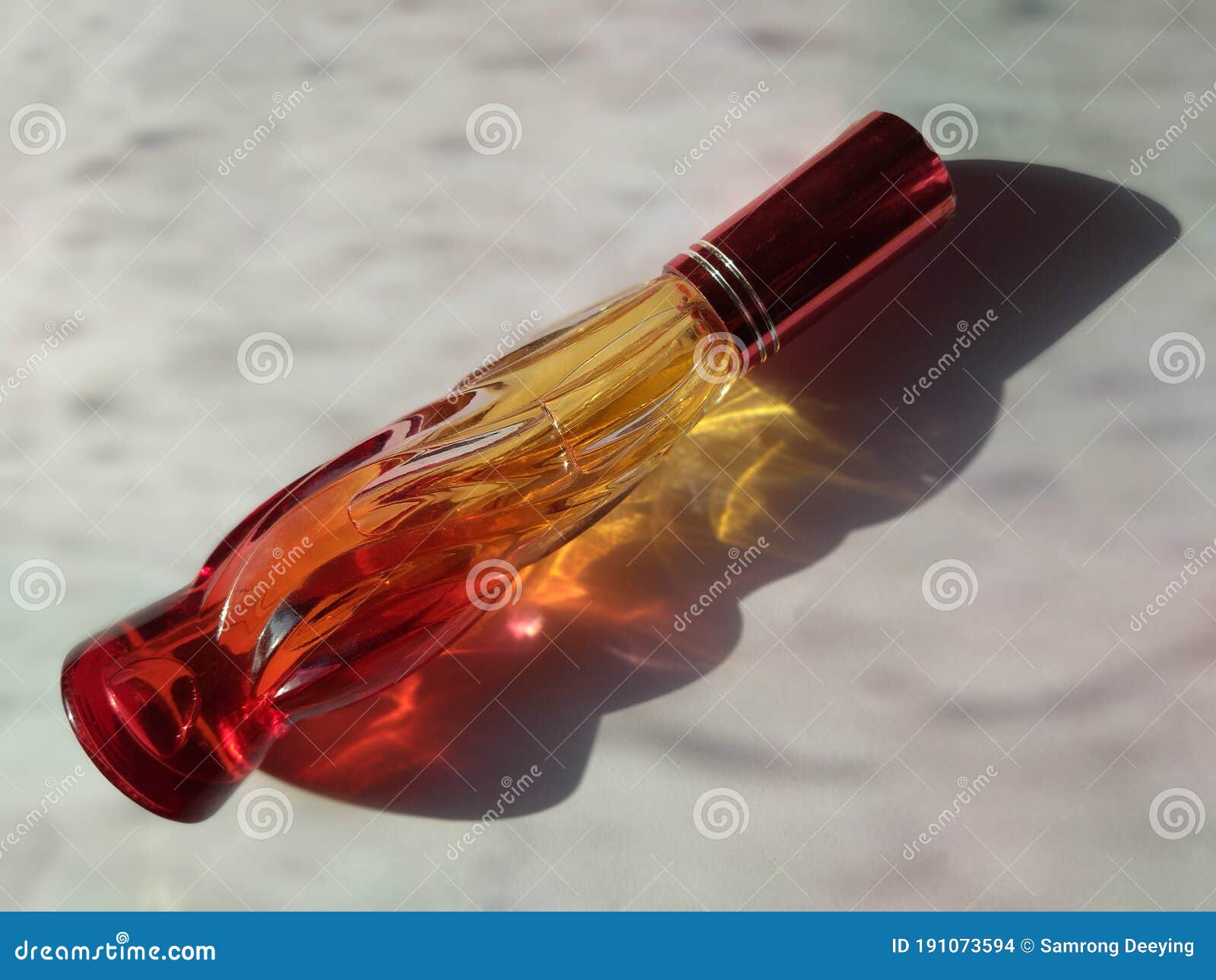 Perfume bottle with shadow stock photo. Image of reflected - 191073594