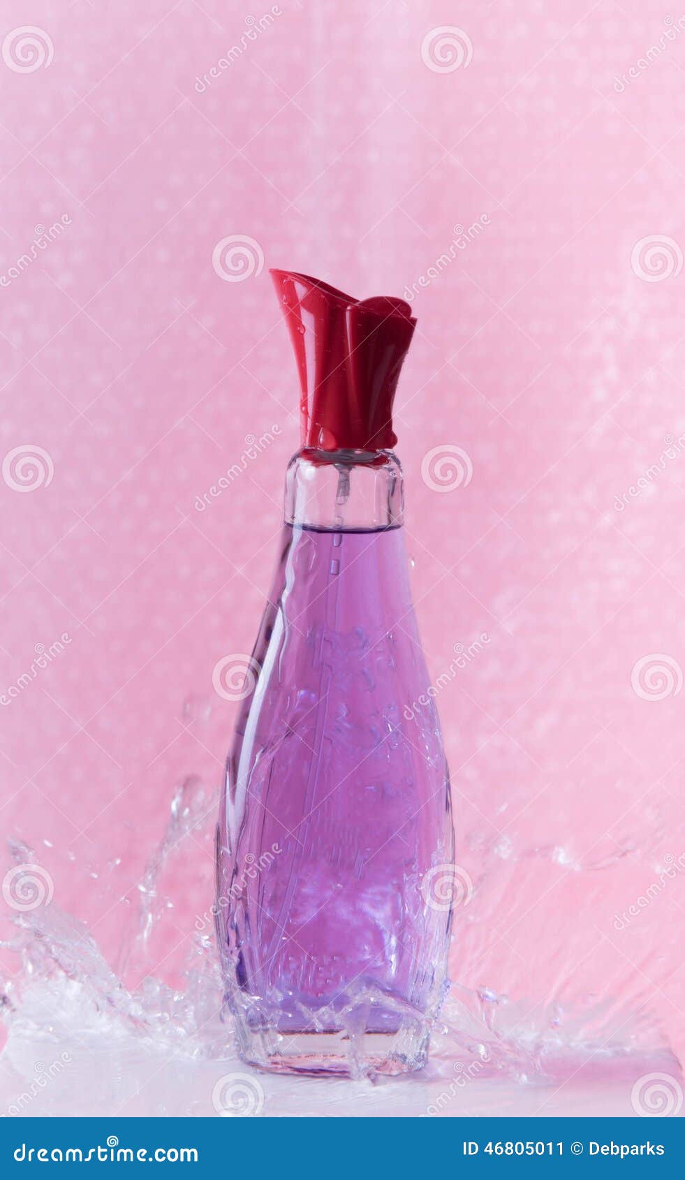 Perfume Bottle Splash on Pink Stock Image - Image of pink, bottle: 46805011