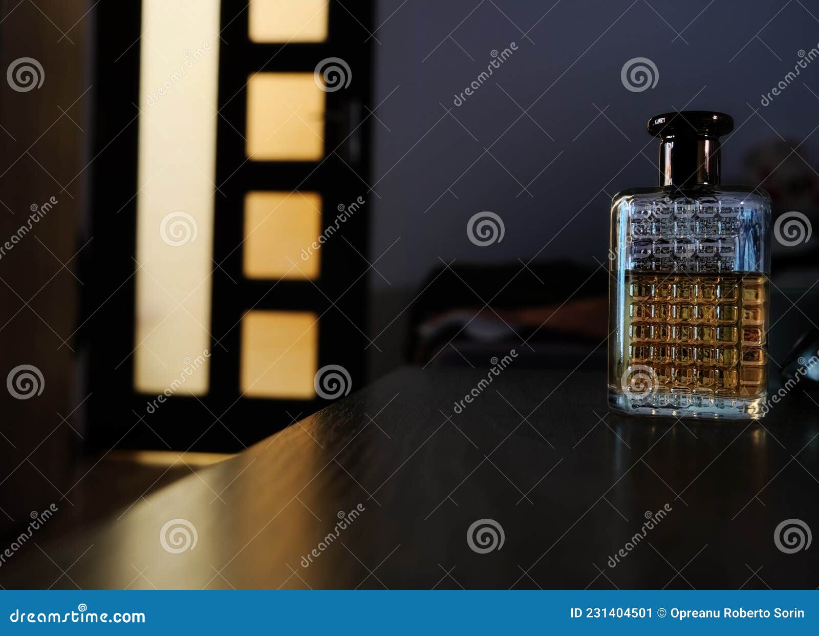 Perfume Bottle on the Table Stock Image - Image of fragrant, fragrance ...