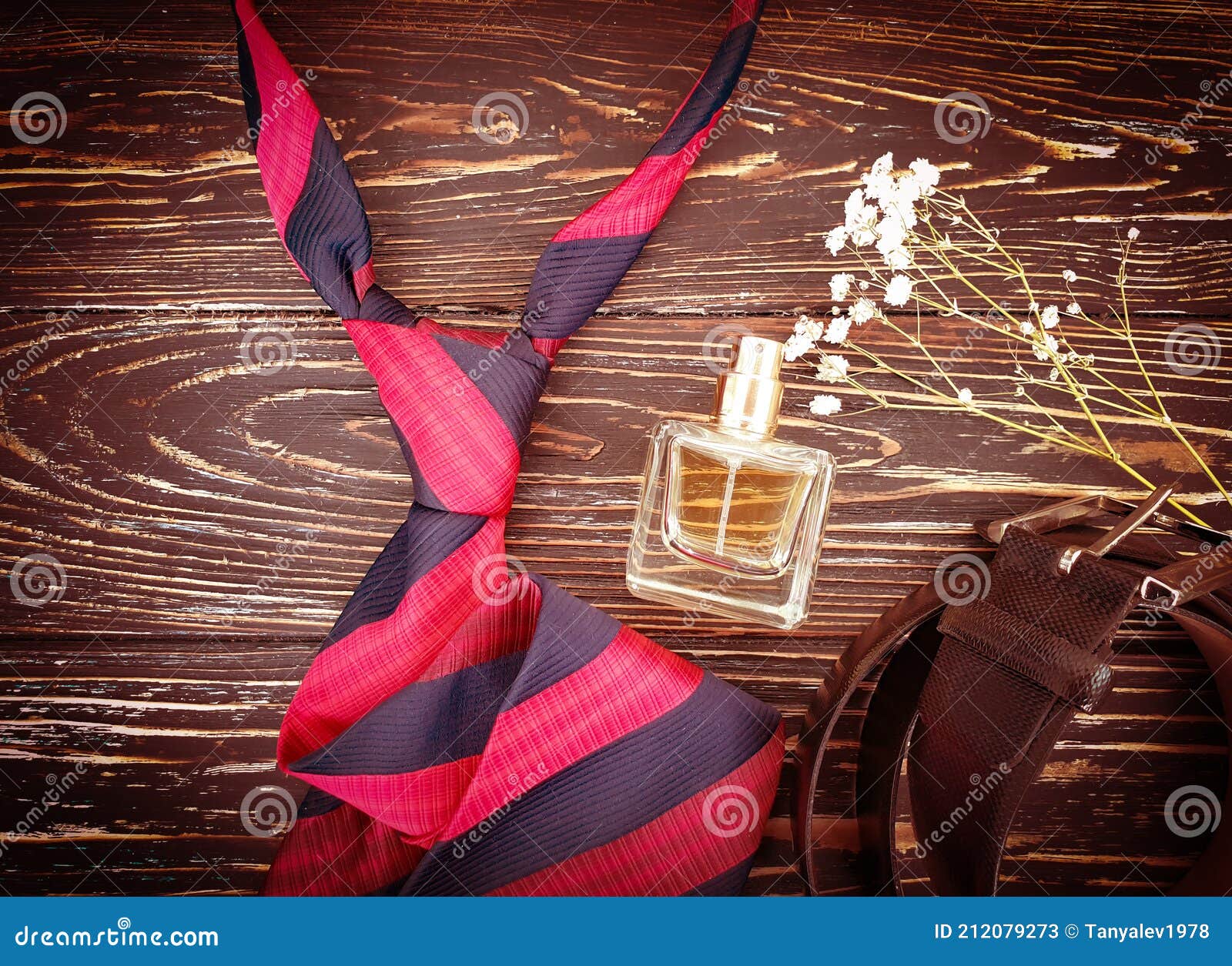Perfume Bottle, Tie Belt on Wooden Background Stock Image - Image of ...