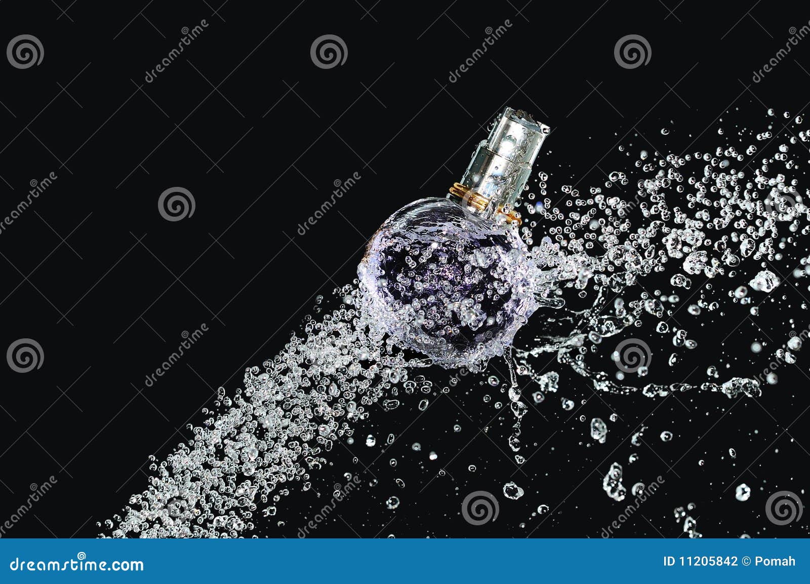 Perfume bottle on water stock photo. Image of drip, black - 11205842