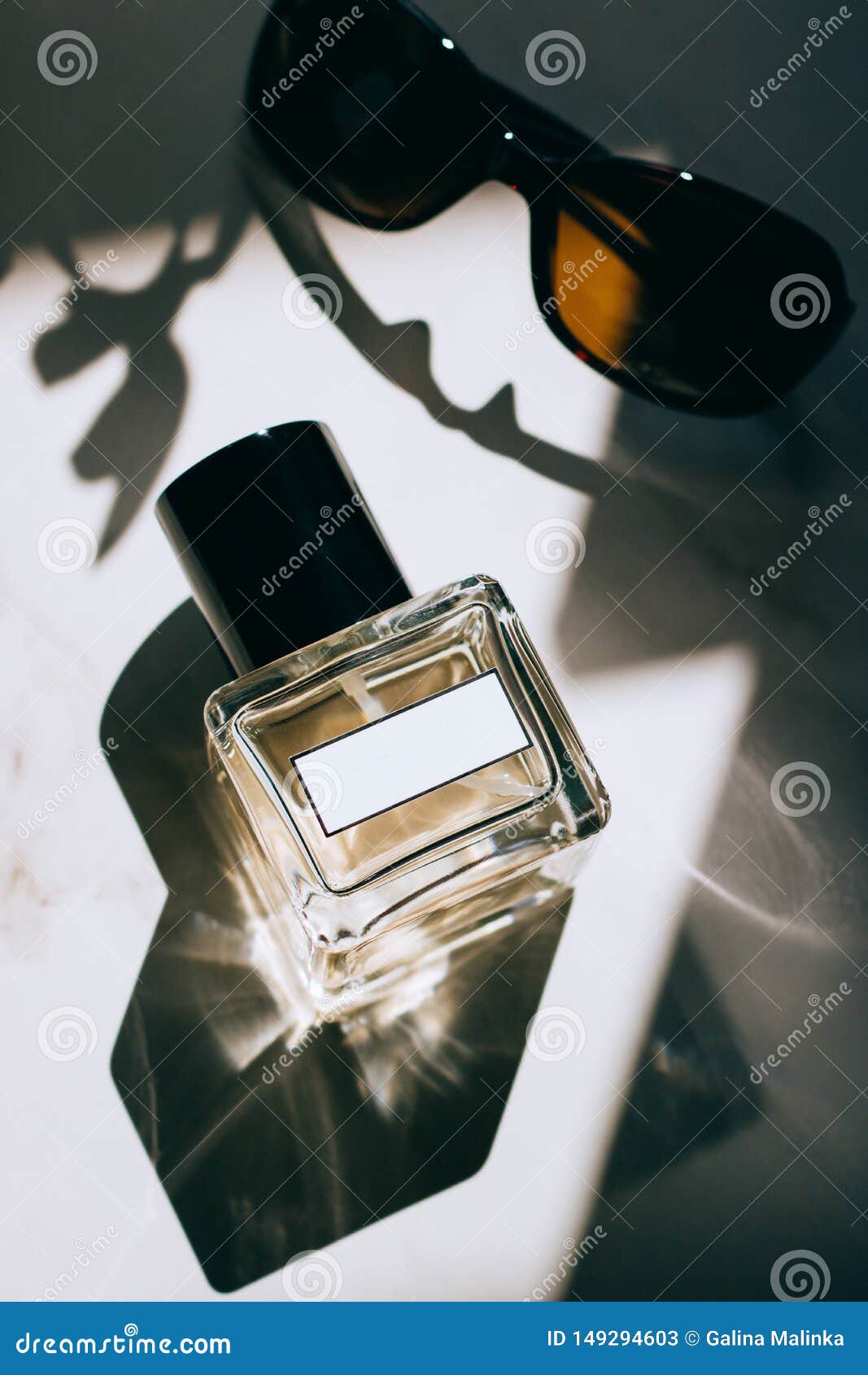 Perfume Bottles with Blank Labels and Sunglasses Stock Image - Image of ...