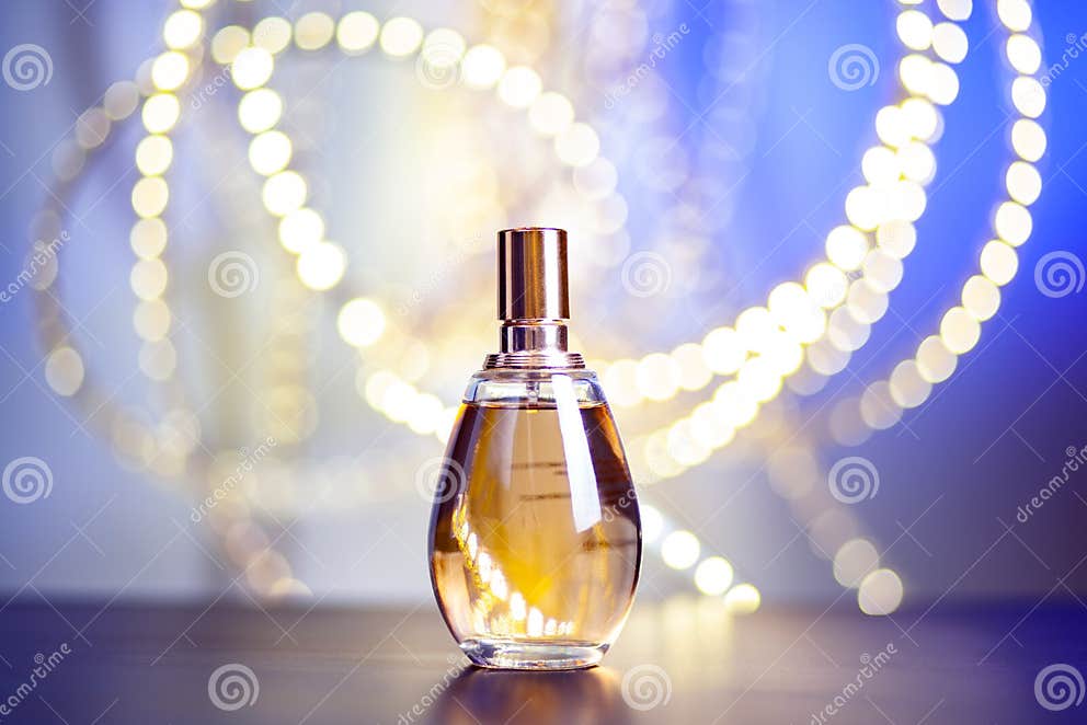 Perfume on Desk on Lights Background Stock Image - Image of body, woman ...