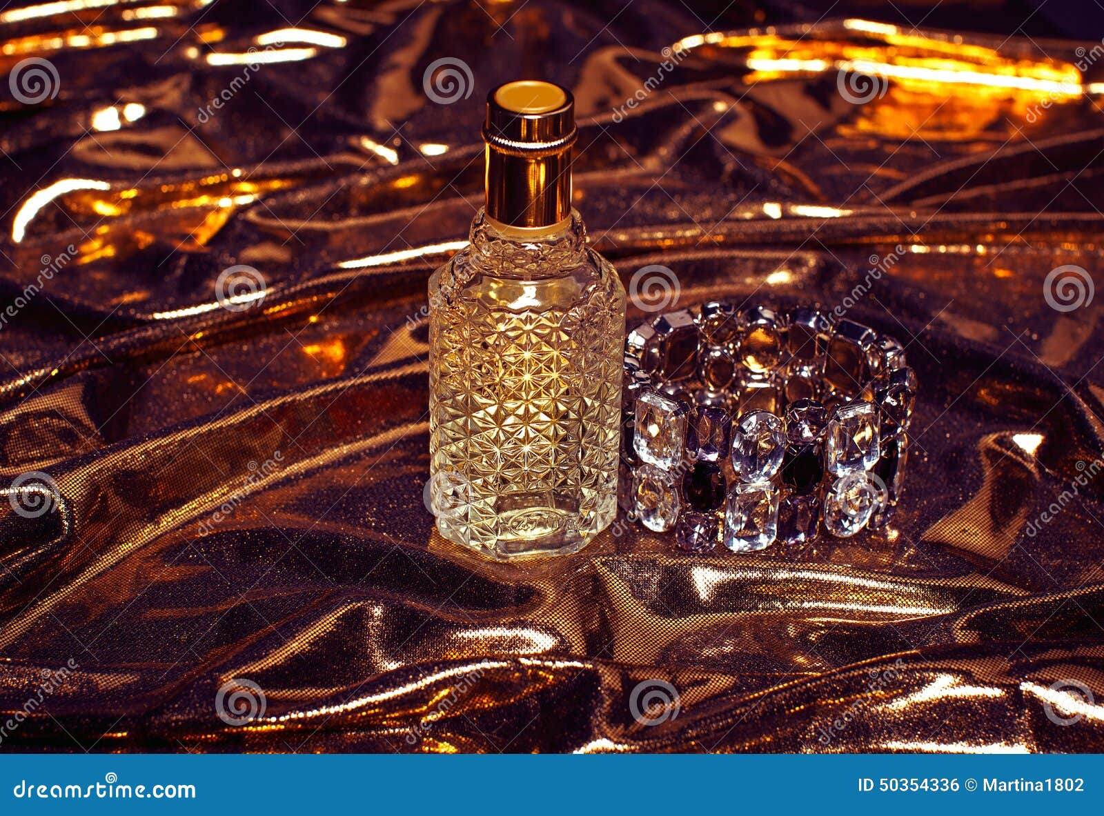 Perfume on gold background stock photo. Image of container - 50354336