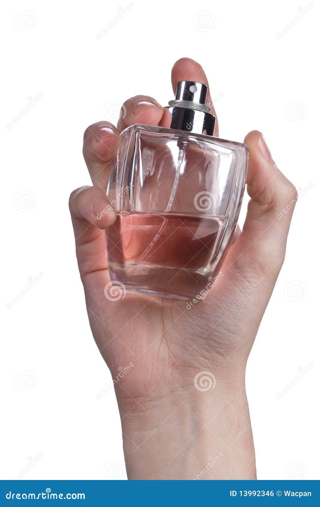 Perfume in hand stock photo. Image of spraying, perfume - 13992346