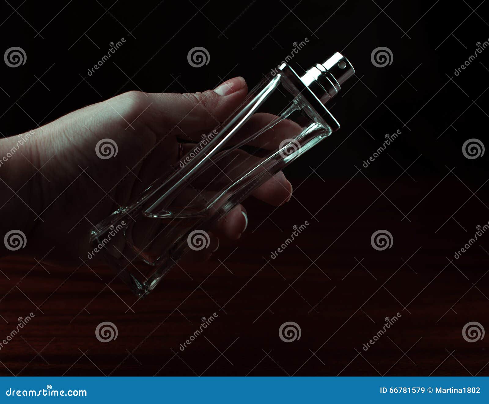 Perfume in hand stock image. Image of beauty, cosmetic - 66781579