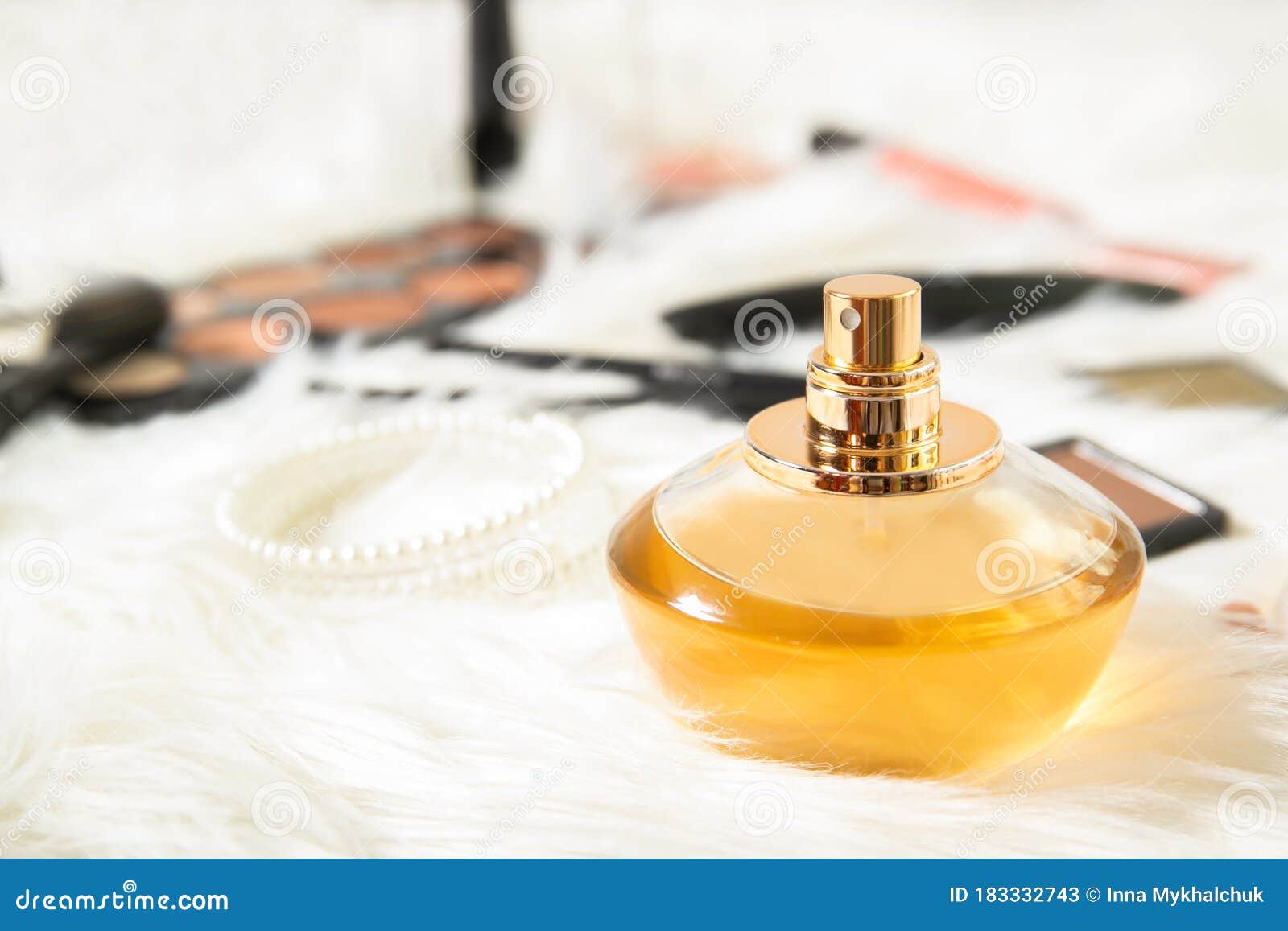 Perfume and Makeup on the Table. Beautiful Composition Stock Image ...