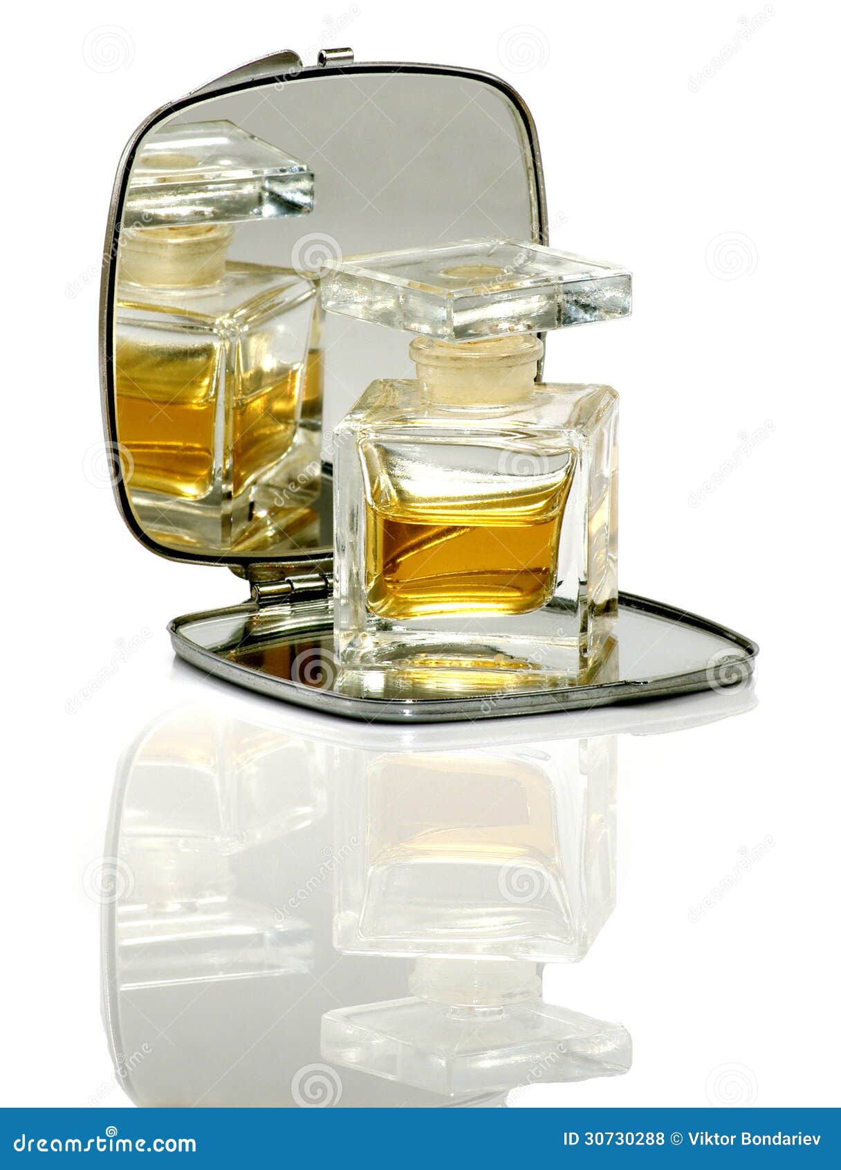 Perfume on the mirror stock photo. Image of cosmetics - 30730288