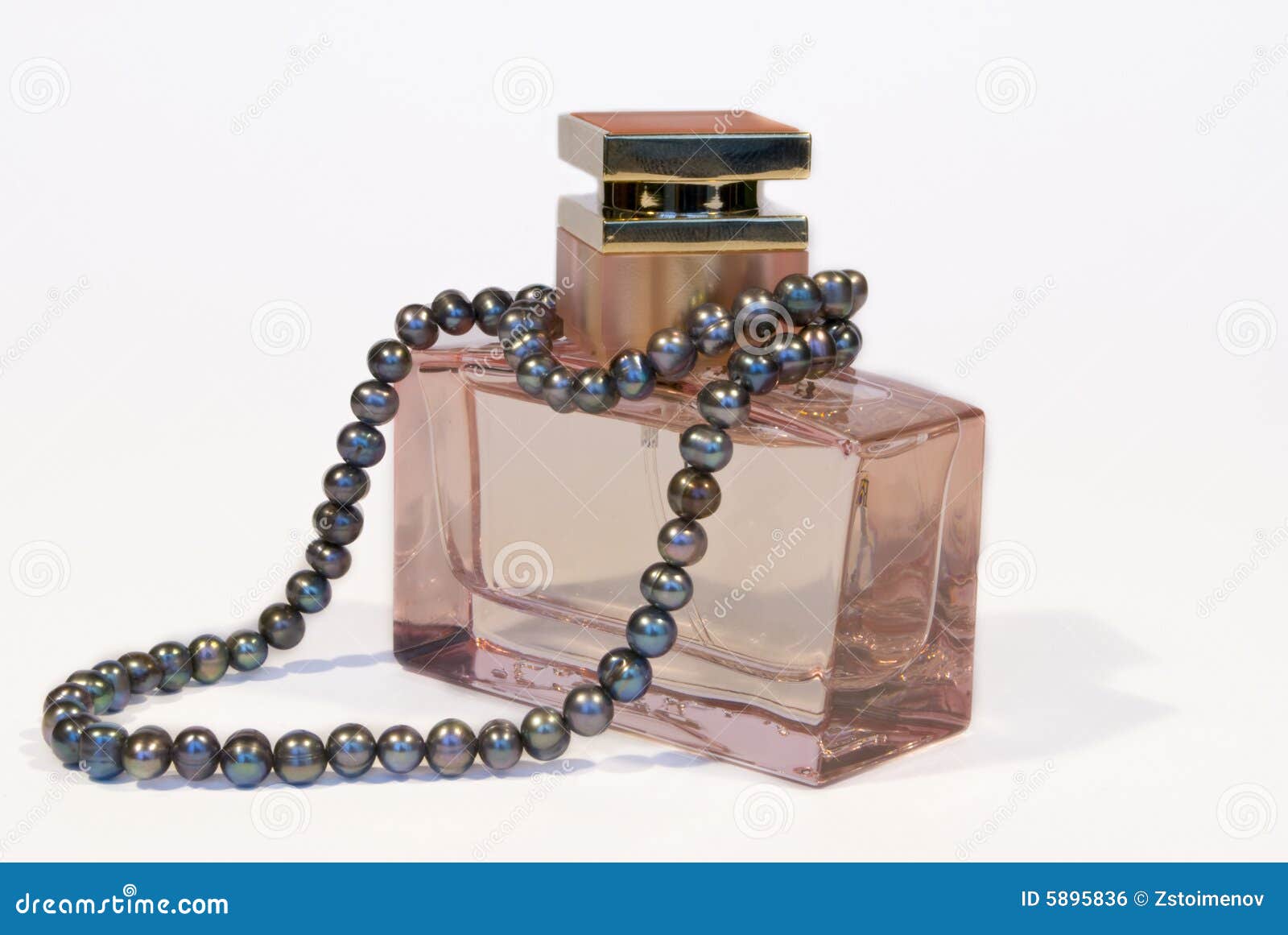 Perfume and pearls stock photo. Image of isolated, scent - 5895836