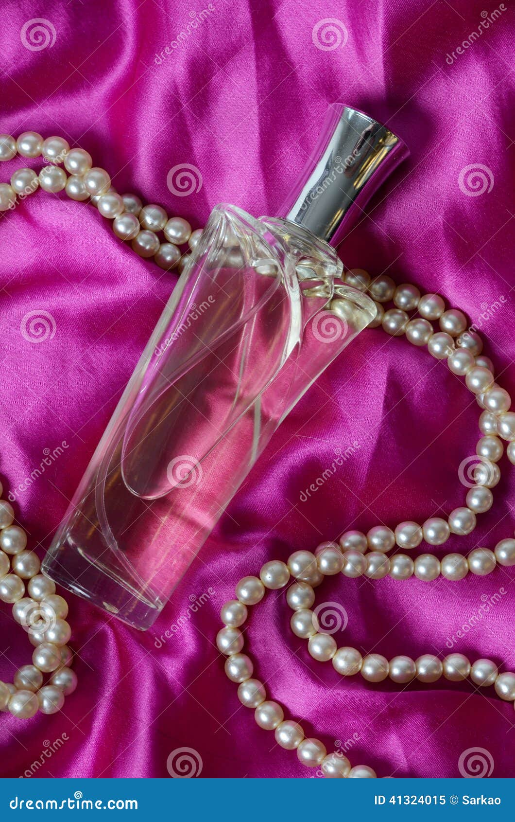 Perfume and pearls stock image. Image of texture, bottle - 41324015