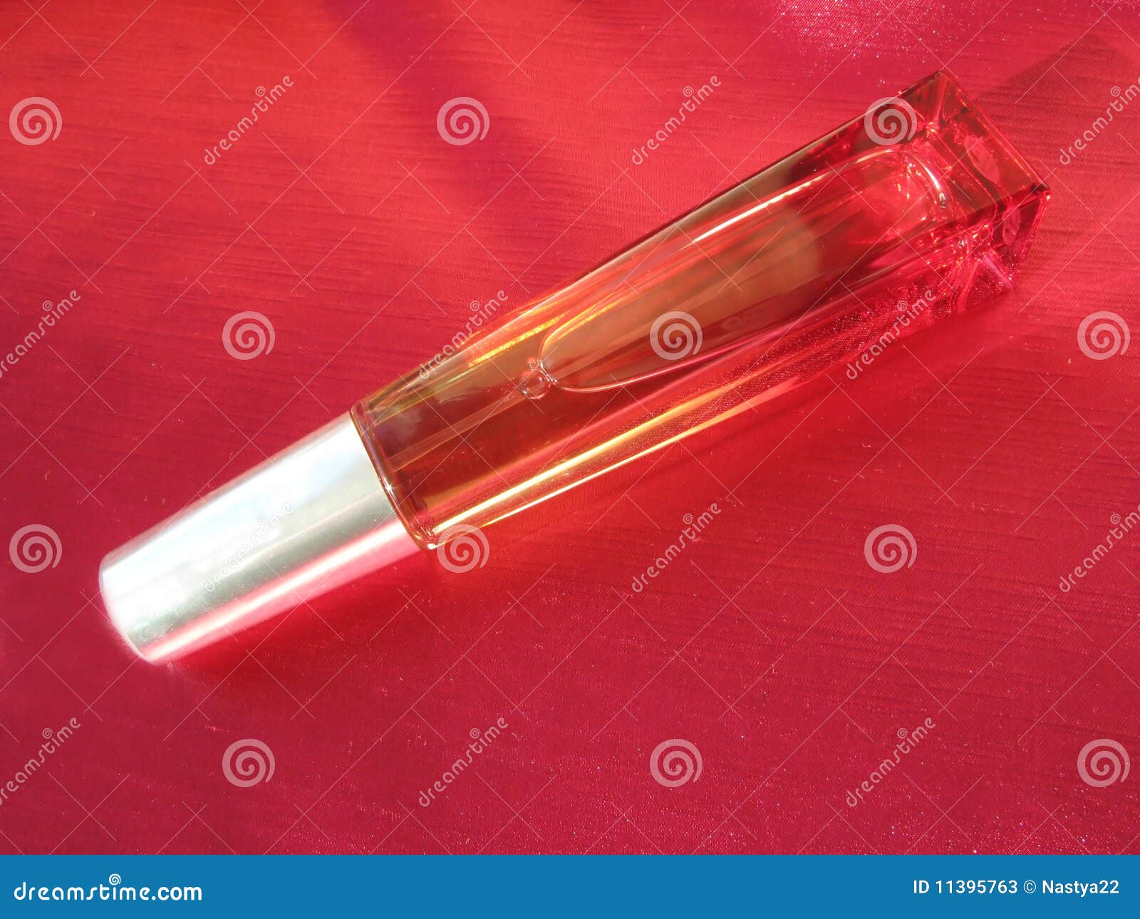Perfume on red cloth stock image. Image of cloth, female - 11395763