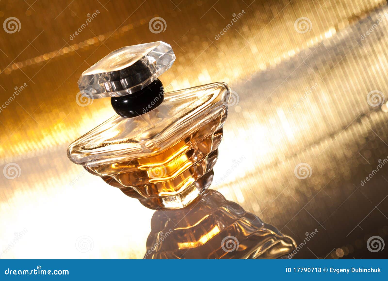 Perfume with Reflection on Gold Background Stock Photo - Image of ...
