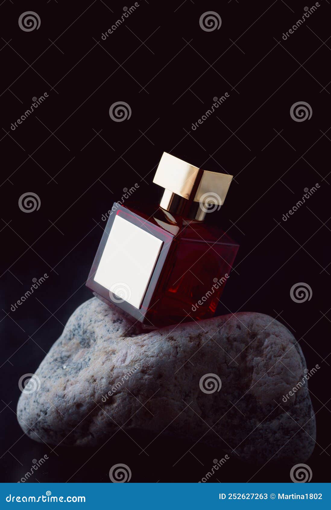 Perfume stands on a stone stock image. Image of aromatic - 252627263
