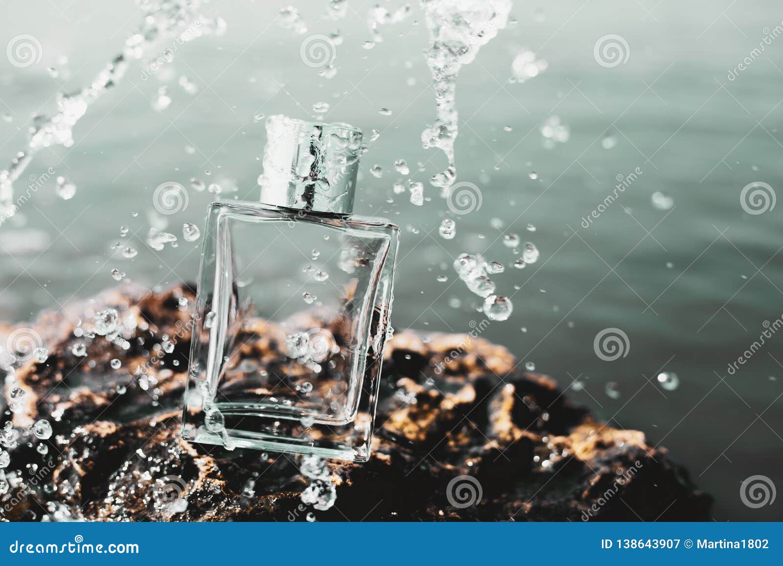Perfume with Water Drops at Sea Background Stock Image - Image of ...