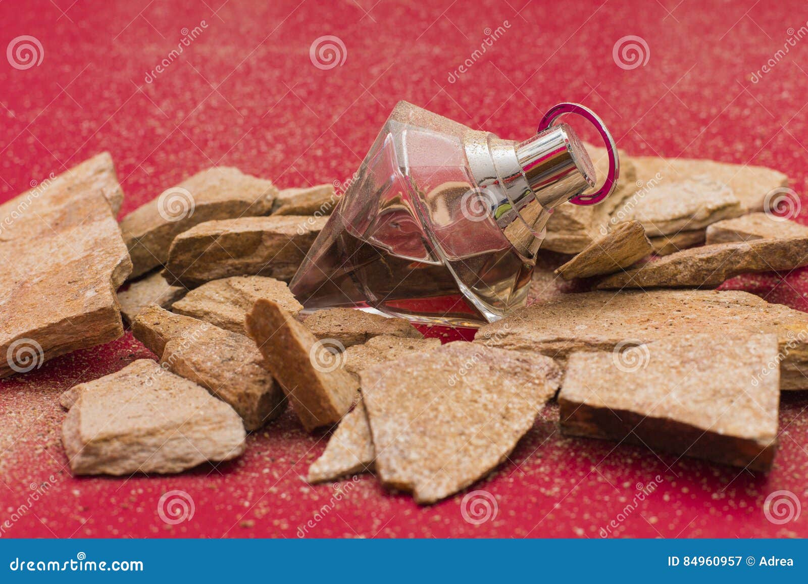Bottle of Perfume on Sand Quarry Rock and Sand Stock Image - Image of ...