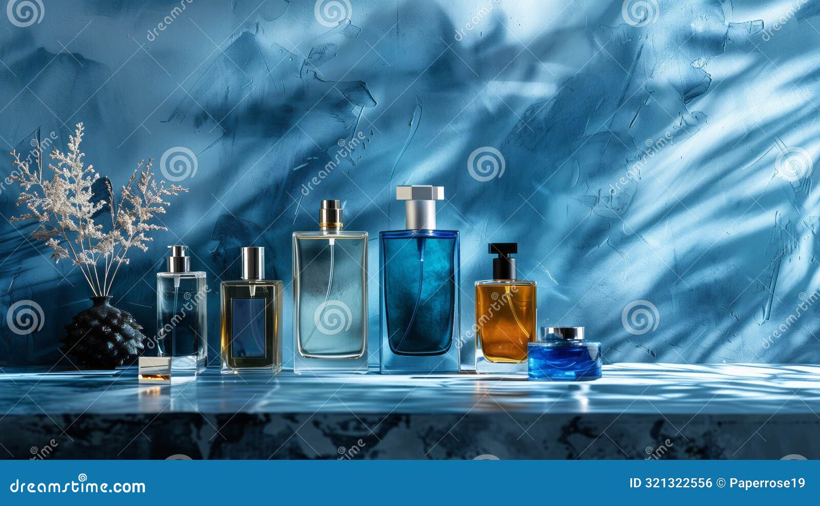 Perfumes Presented on a Cool Blue Backdrop Stock Photo - Image of form ...