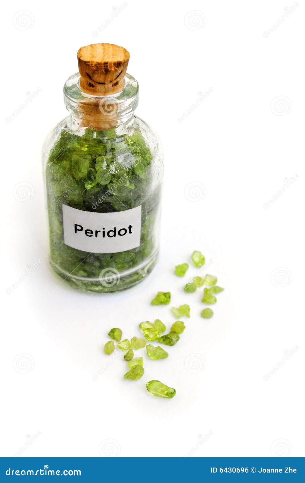 Peridot Gem Stones in Bottle Stock Photo - Image of colorful, glass ...