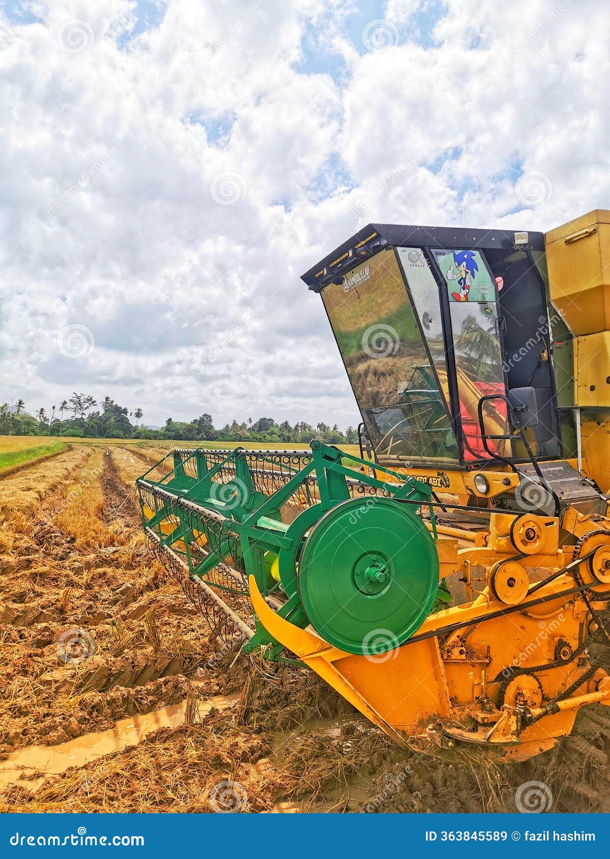 PERLIS, Malaysia-February 26, 2025: Paddy Rice Machine On Paddy Field ...