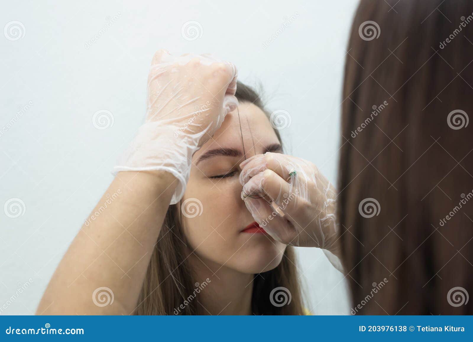 Permanent Makeup, Eyebrow Tattoo. the Master Draws Lines with a Thread ...