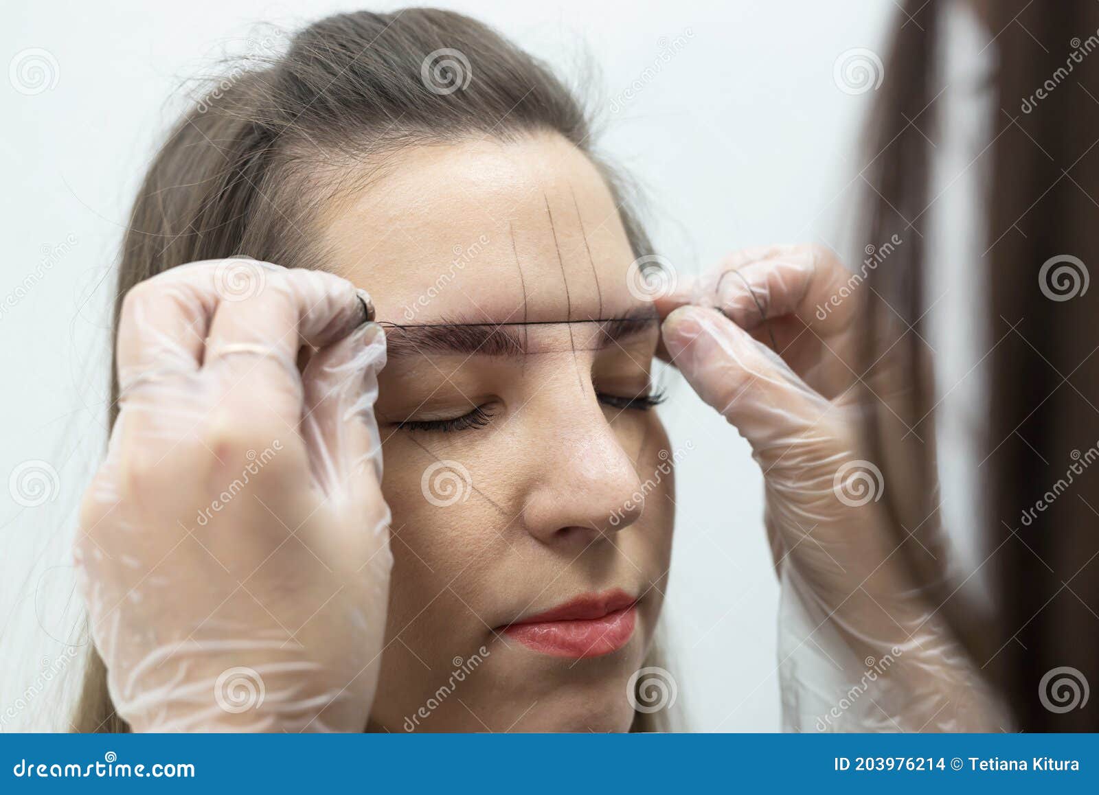Permanent Makeup, Eyebrow Tattoo. the Master Draws Lines with a Thread ...