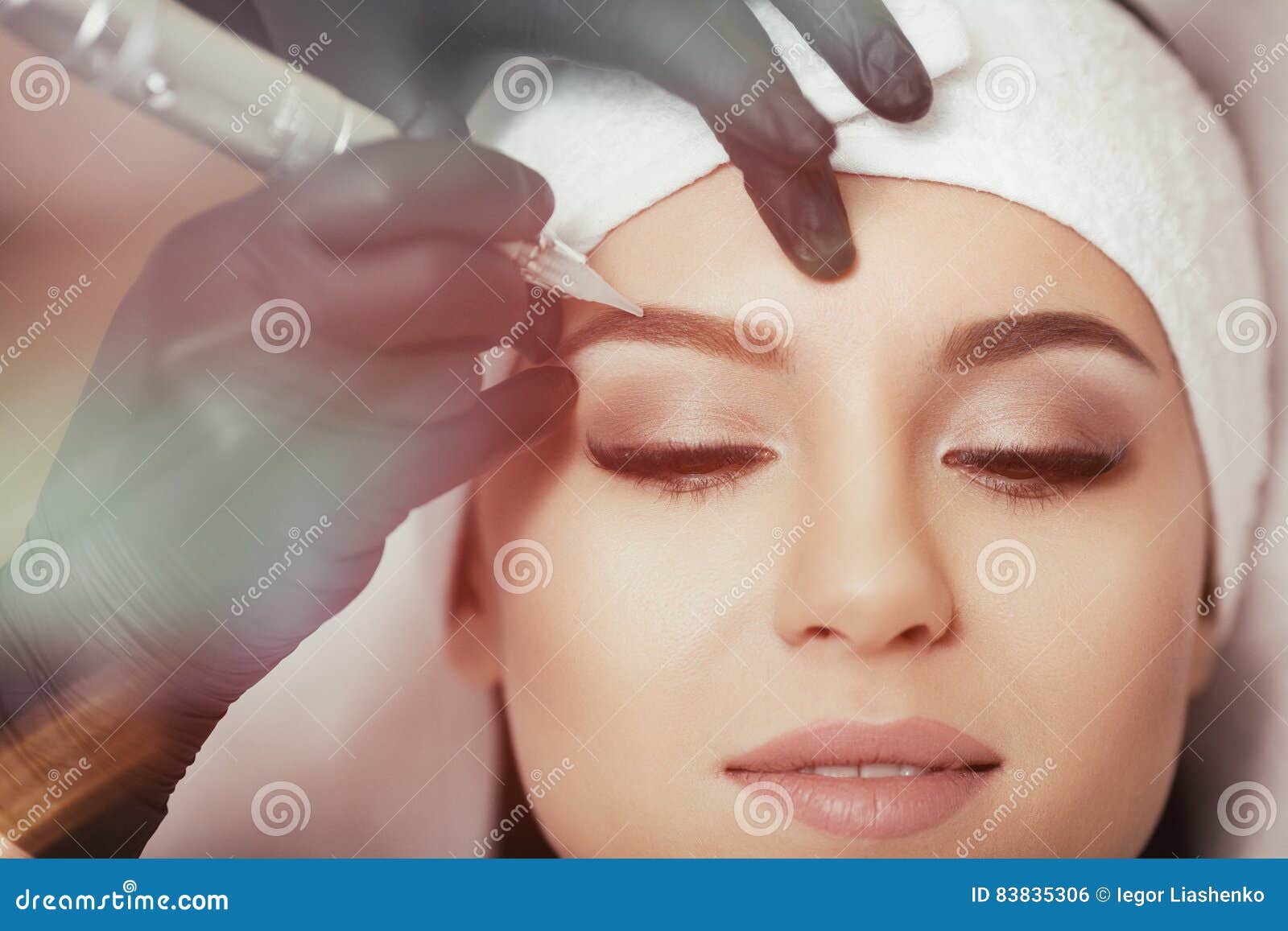 Permanent Makeup. Tattooing of Eyebrows Stock Photo - Image of hand ...
