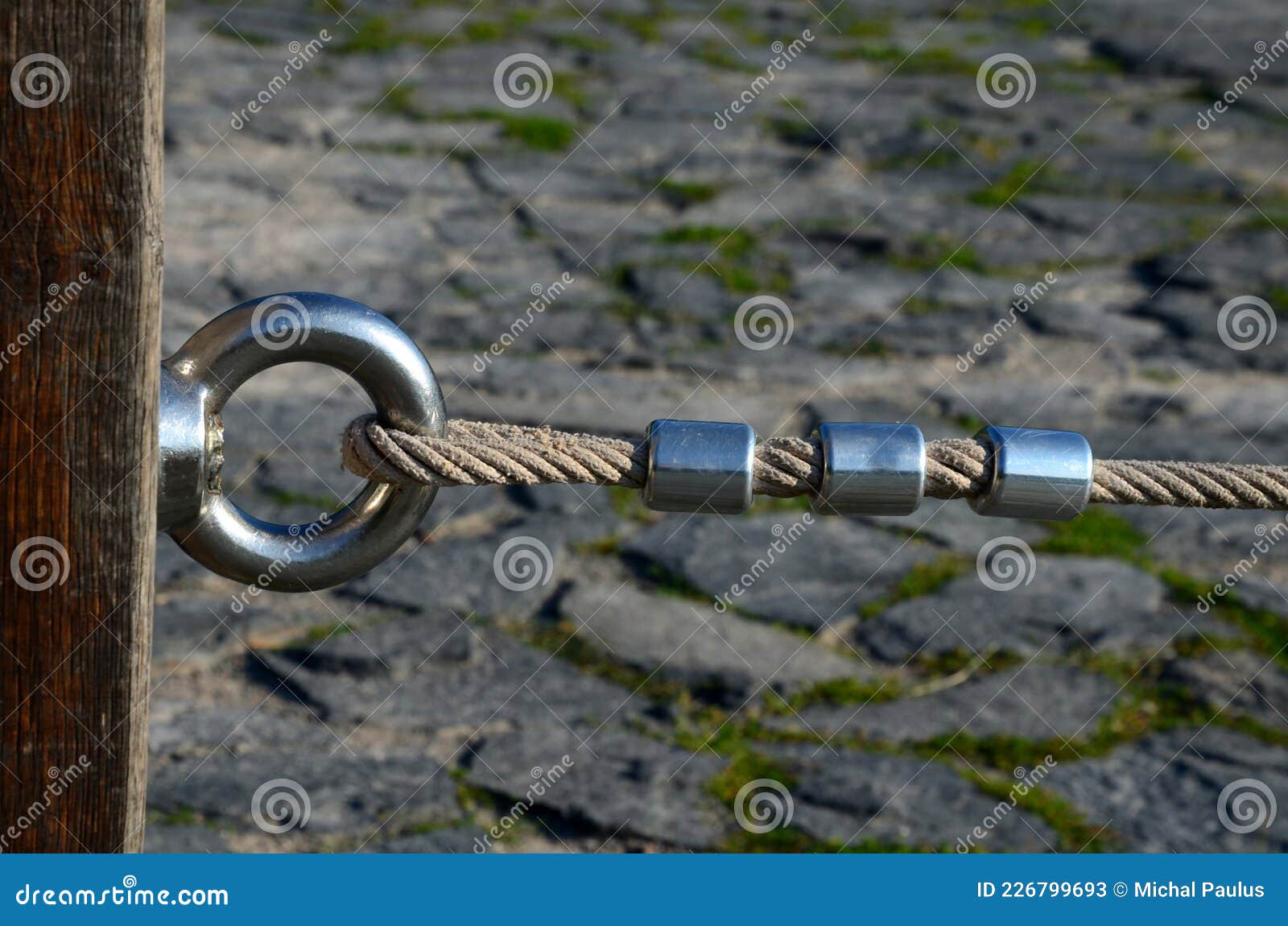 Permanent Securing of the Rope To the Pole. a Steel Eye is Screwed ...