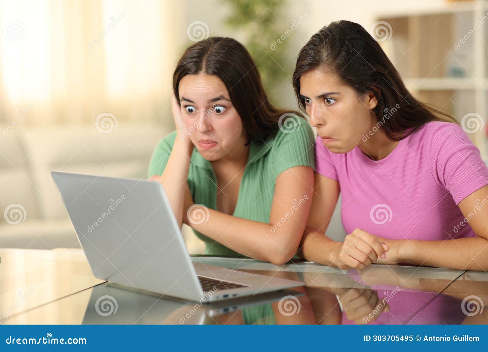 Perplexed Friends Checking Laptop at Home Stock Image - Image of ...
