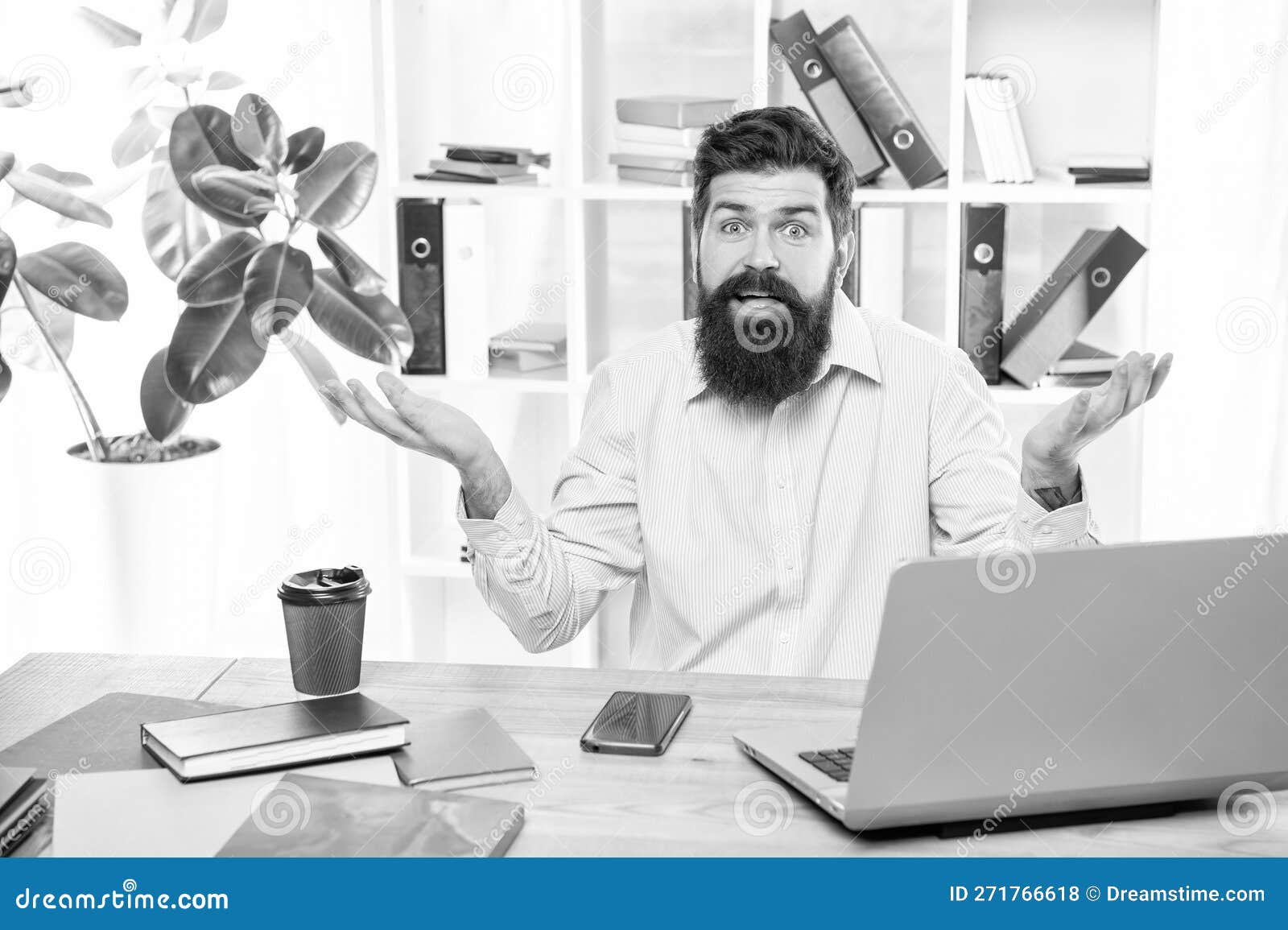 Perplexed Guy Making Helpless Gesture Working at Office Desk ...