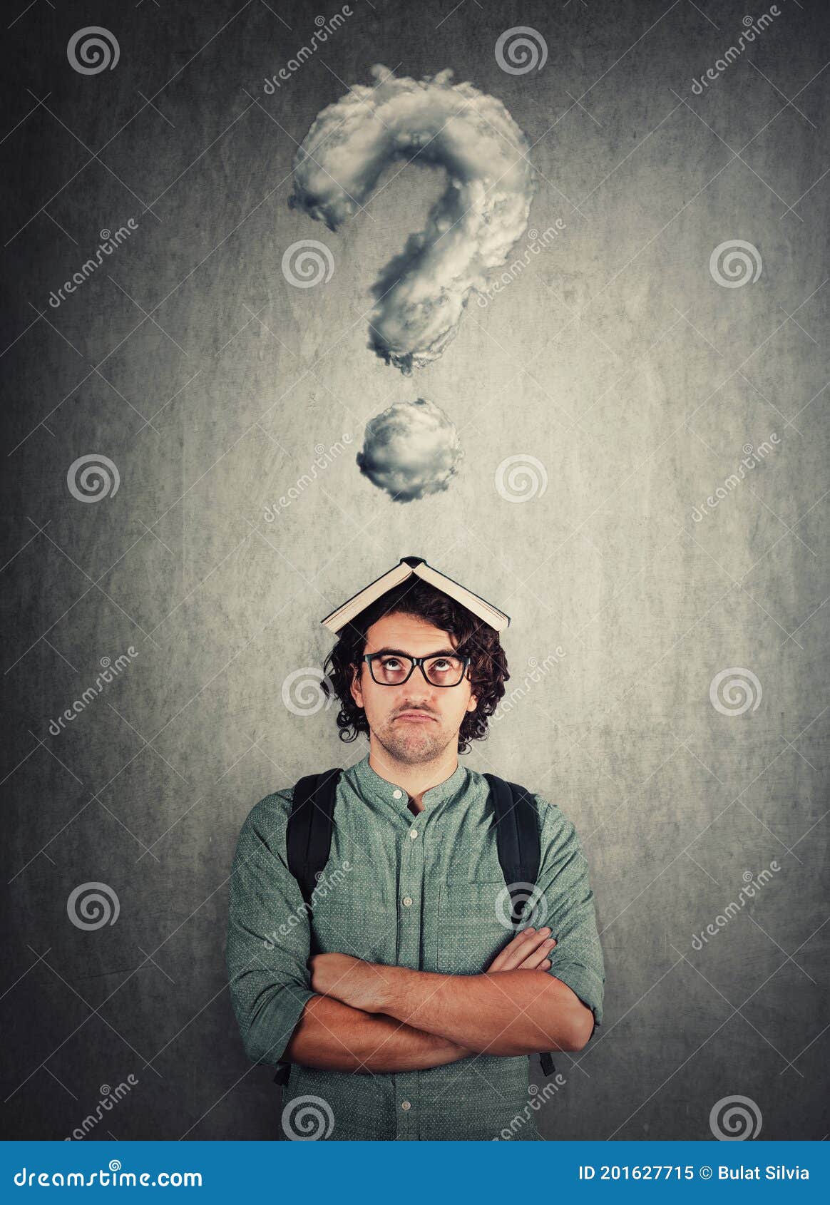 Perplexed Student Guy with Book on His Head, Looking Up Tired of ...