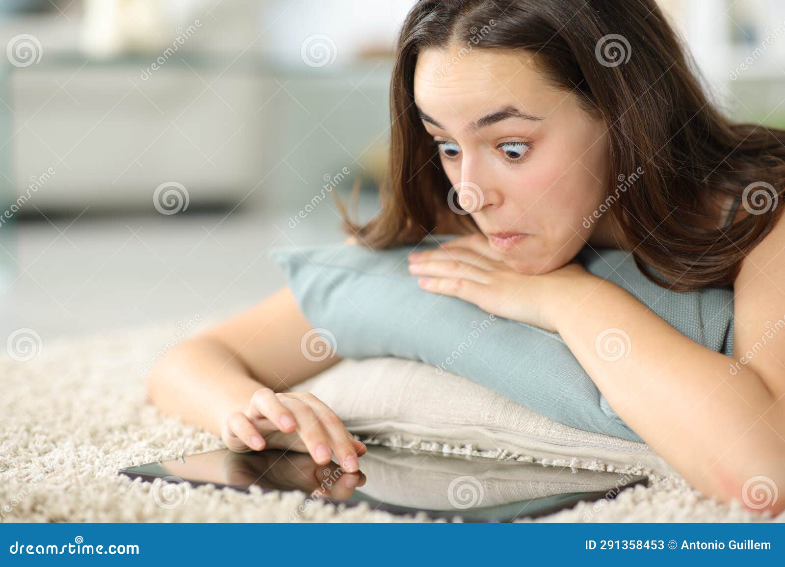 Perplexed Woman Using Tablet at Home Stock Image - Image of unexpected ...